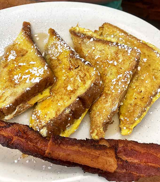 French toast that makes you question why you ever bothered with cereal. That bacon is playing a perfect supporting role.