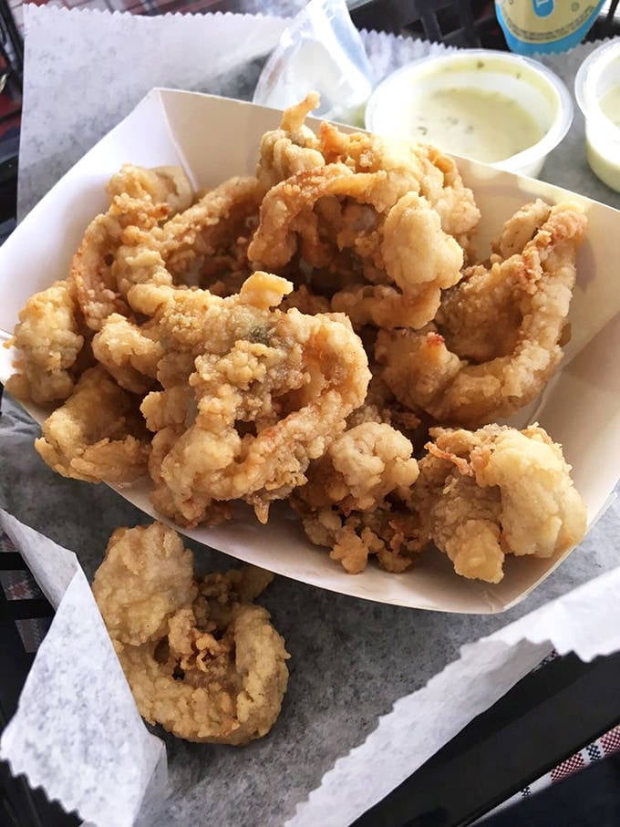 These aren't just fried clams&mdash;they're crispy, golden tickets to seafood heaven, best enjoyed with a squeeze of lemon.