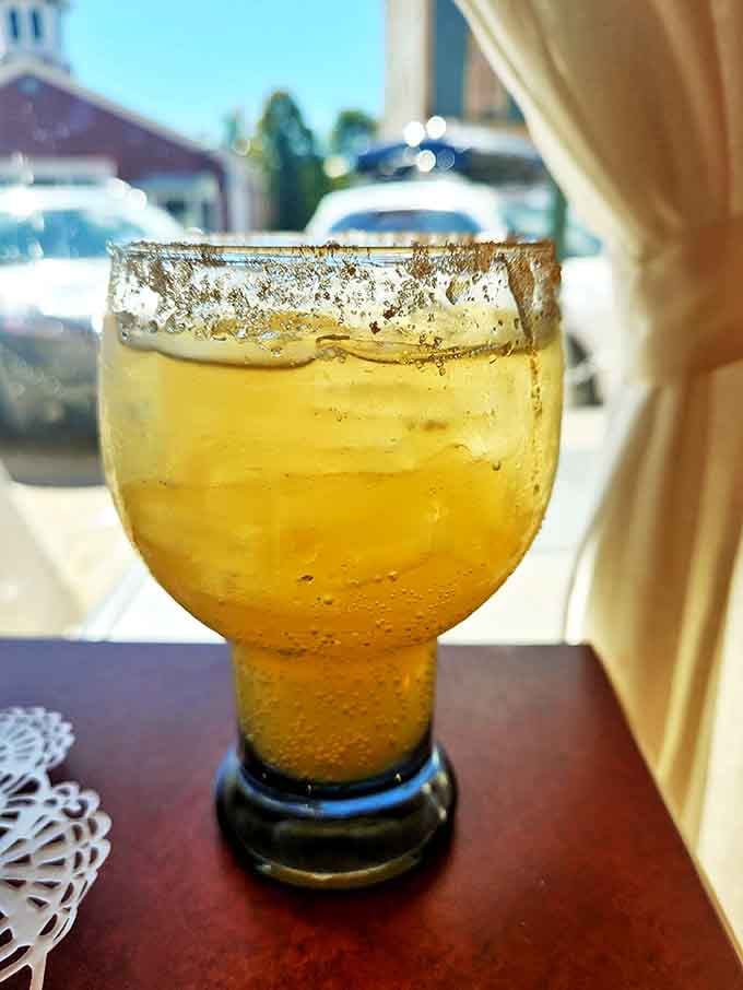 Sunshine in a glass &ndash; this golden margarita with its salt-rimmed edge offers a moment of vacation vibes right in downtown Bristol.