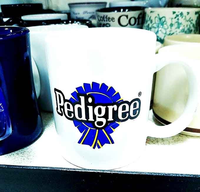 Mug archaeology at its finest! That Pedigree cup probably served morning coffee to someone who hit snooze three times before walking the dog.