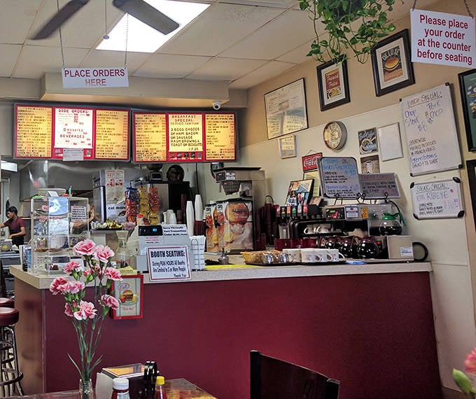 The beating heart of the operation. Those menu boards haven't changed in decades because perfection doesn't need updating.