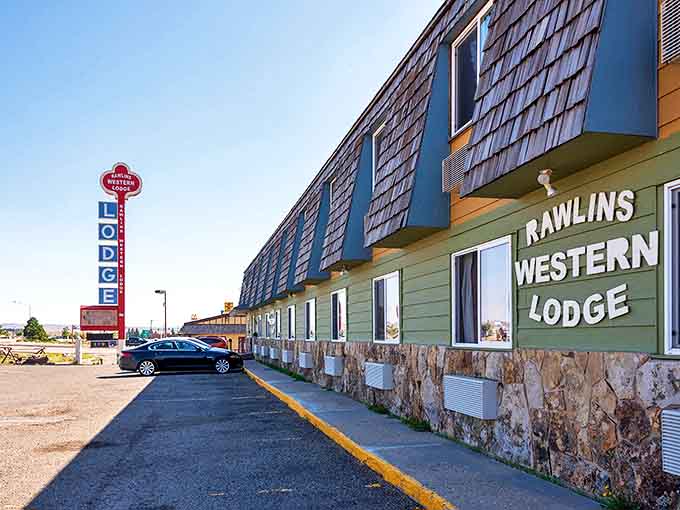 The Rawlins Western Lodge offers no-nonsense accommodations for travelers passing through, its vintage sign a beacon on the high plains.