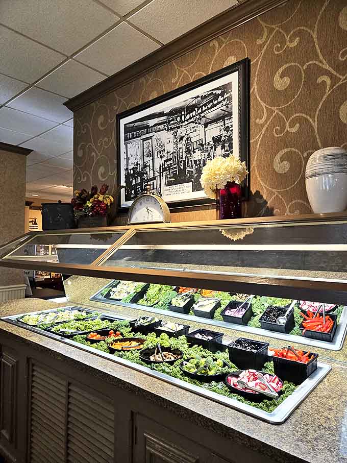 The salad bar offers fresh, colorful ingredients for those who want to pretend they're eating healthy before diving into dessert.