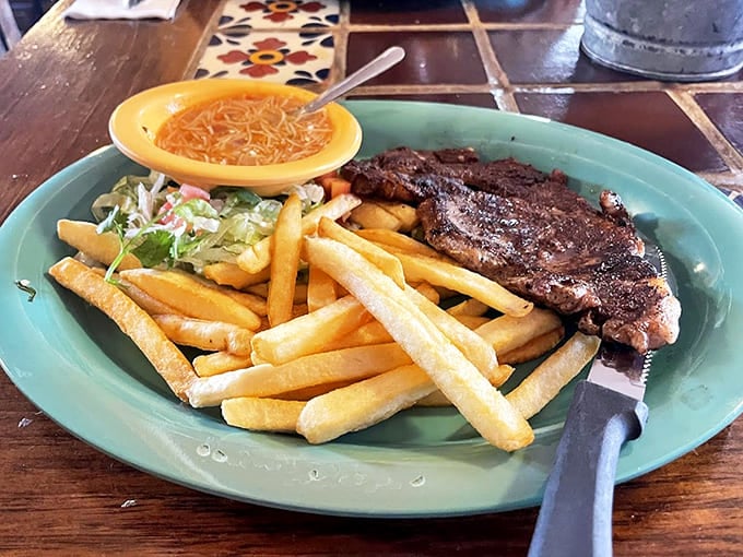 A steak that doesn't need a fancy steakhouse to shine. Perfectly seared sirloin with golden fries proves that sometimes simplicity is the ultimate sophistication.