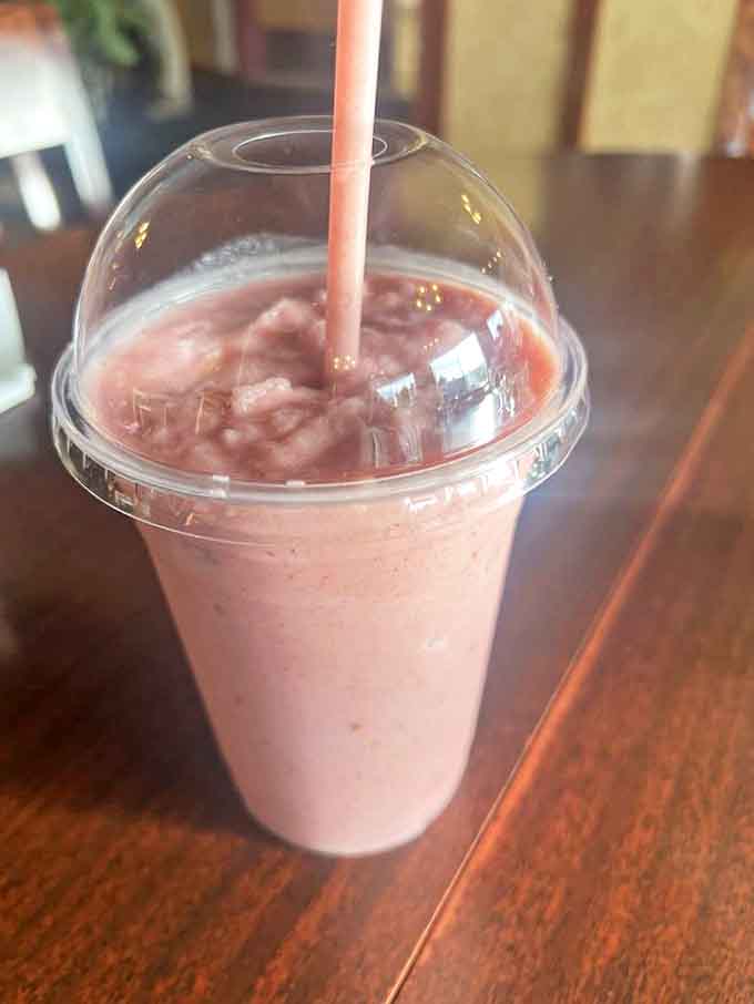 This pink smoothie isn't just a drink—it's summer in a cup. The kind of refreshment that makes you forget you're in a state where winter is practically a personality trait.