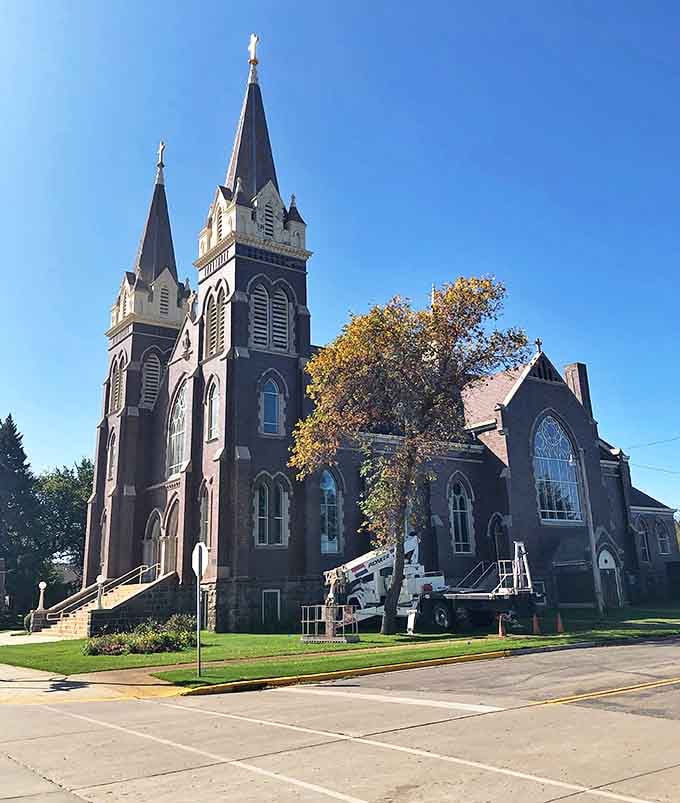 St. James Basilica reaches skyward with twin spires that have oriented travelers for generations. Gothic grandeur on the prairie that would impress even European visitors.