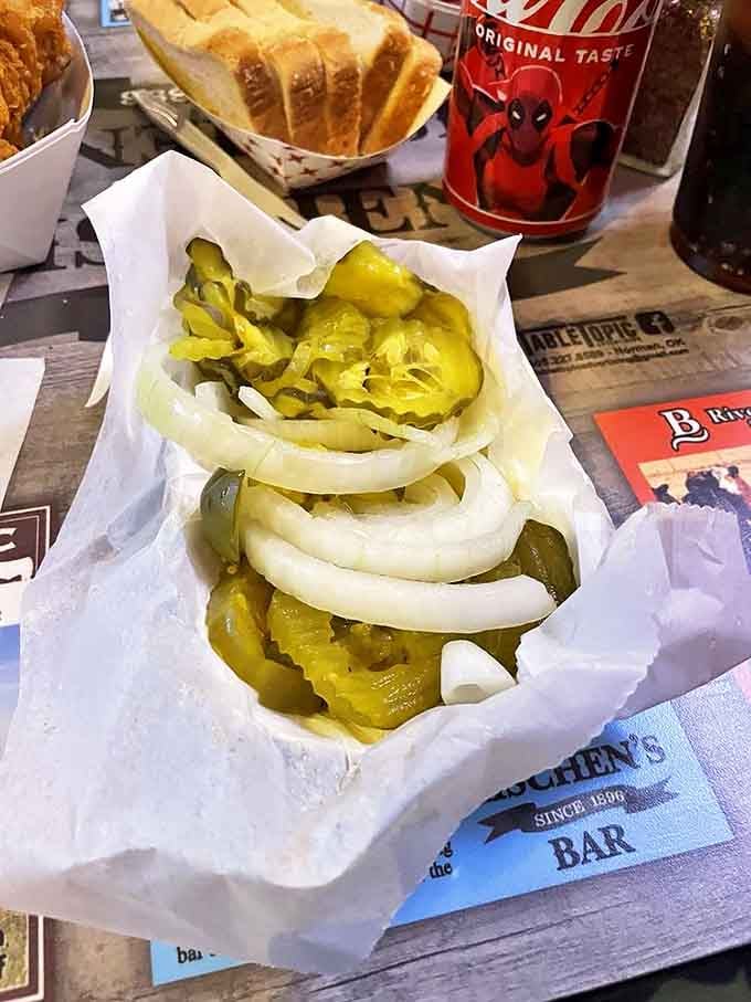 The supporting cast that deserves a standing ovation &ndash; pickles and onions that cut through richness with their tangy, sharp personalities.