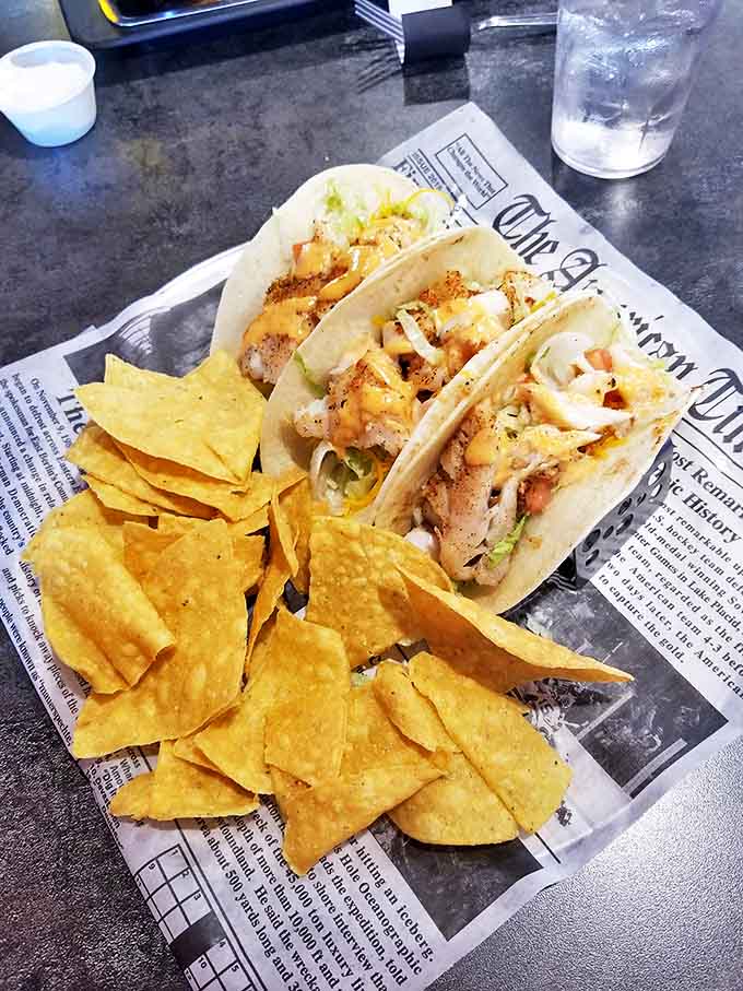 These tacos aren't just served&mdash;they're presented like edible art, with each colorful layer contributing to a symphony of Tex-Mex flavors.