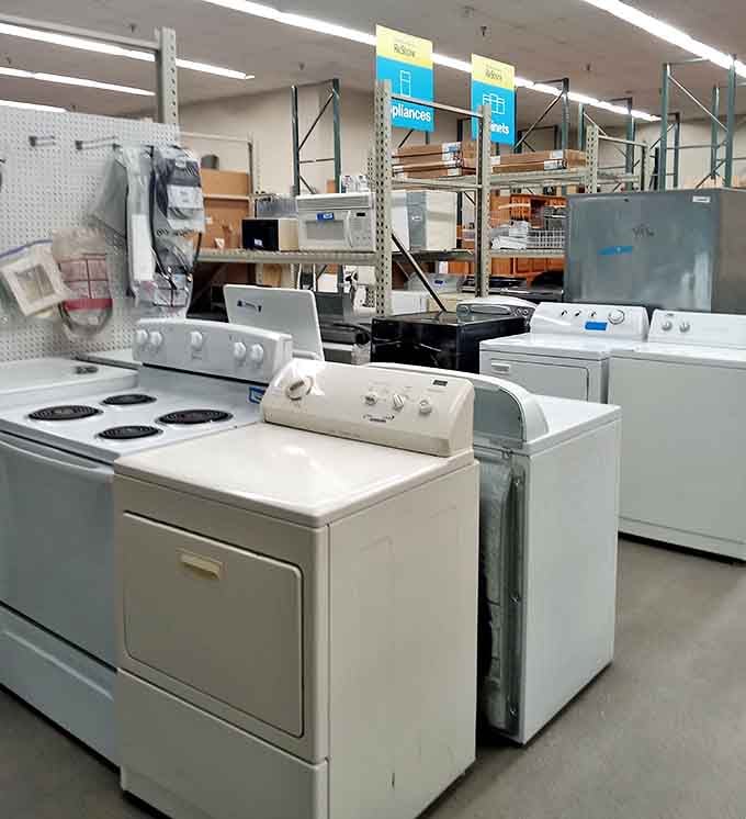 Appliance row stands ready with washers, dryers, and stoves&mdash;all tested and working, waiting to rescue someone from laundromat purgatory.