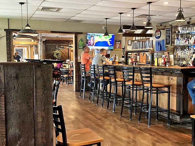 The bar area: Where solo diners become regulars and strangers become friends over craft beers and burger debates.
