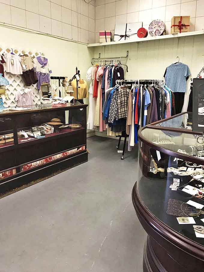 Vintage clothing and jewelry displayed with care &ndash; that curved glass counter probably witnessed the purchase of someone's engagement ring decades ago.