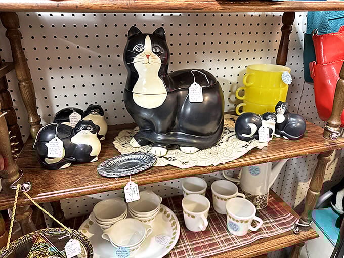 These ceramic cat cookie jars aren't judging you for taking another cookie&mdash;they're judging your entire life choices.