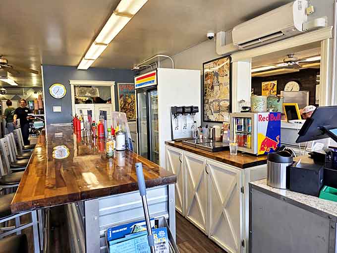 The heart of any good diner is its counter. This one's wooden top has likely heard more local news and weather predictions than the town newspaper.