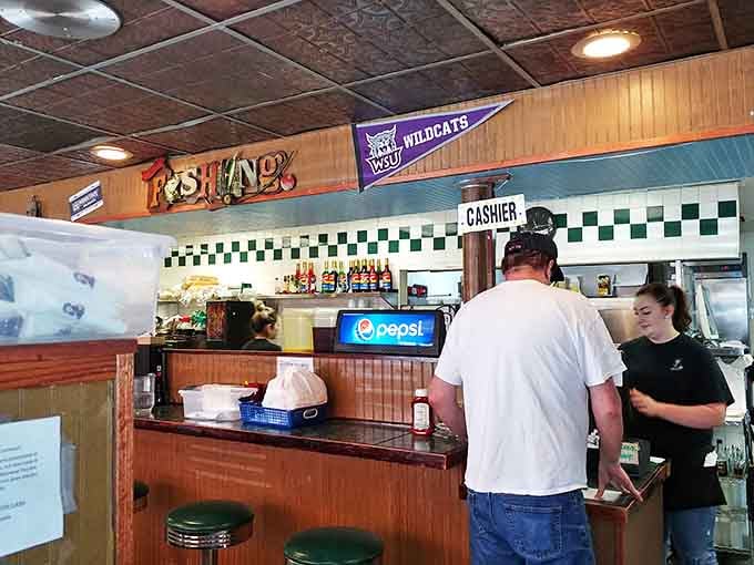 The counter area, complete with Weber State pennant, where regulars exchange local gossip and waitresses call everyone "hon" regardless of age or status.