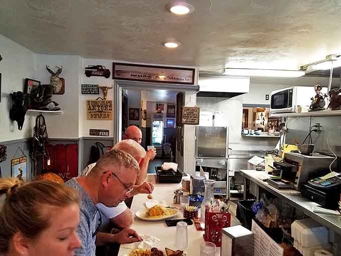 The counter seats&mdash;where solo diners find community, regulars find their usual spots, and everyone finds conversation as satisfying as the food.
