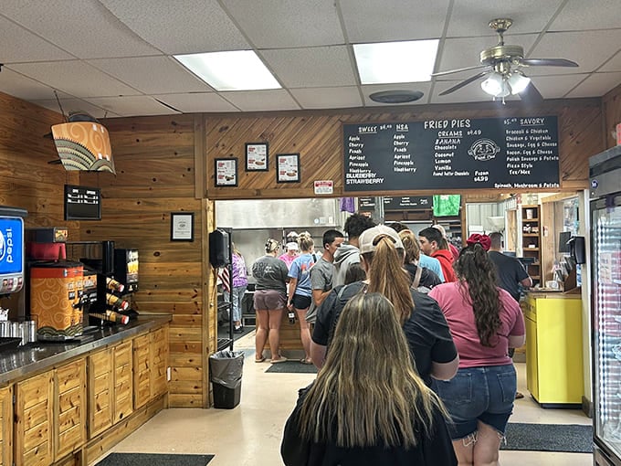 The line forms early and with purpose. Pie pilgrims making their devotions at the altar of flaky crust and perfect fillings.
