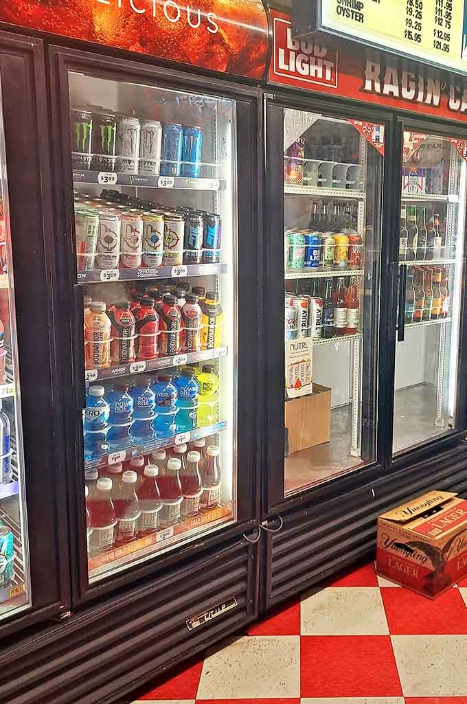 The drink coolers stand ready with cold refreshment&mdash;the unsung heroes in the po'boy experience. That first sip after a spicy bite? Pure relief.