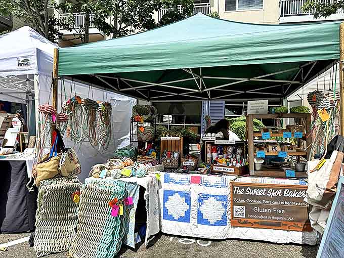 A vendor's carefully arranged display showcases handcrafted goods. Someone's passion project becomes your conversation starter.