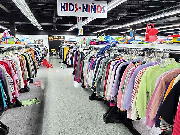 The kids' section: a rainbow road of tiny fashions. Where little wardrobes get refreshed without parents needing a second mortgage for growth spurts.