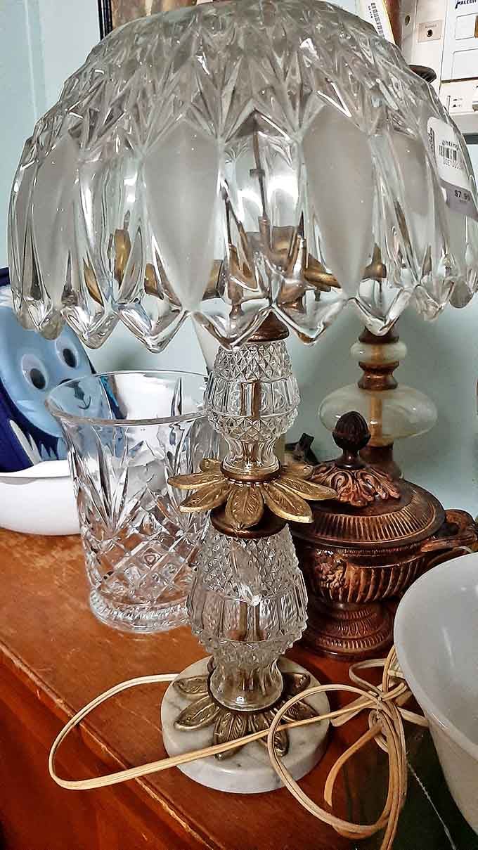 Crystal catches light like diamonds on a budget. Grandma's fancy lamp gets a second act in someone else's living room.