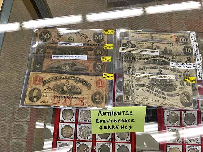 Confederate currency under glass&mdash;history's expensive lesson that not all money maintains its value, especially when you lose the war.