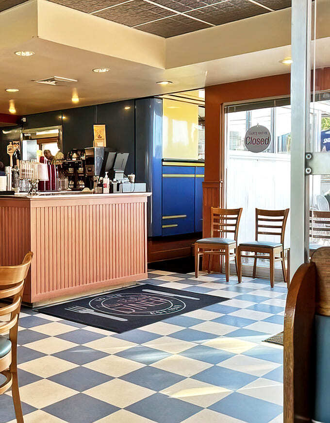 The entrance area blends vintage charm with modern touches. Like walking into your favorite old movie that's been carefully colorized.