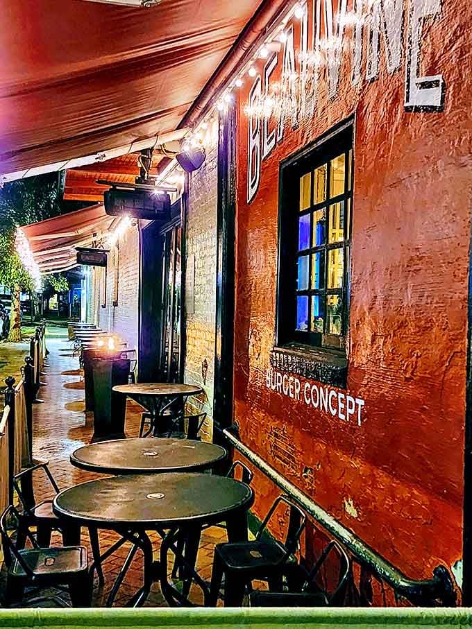 Evening ambiance that turns a simple meal into an occasion &ndash; string lights transform this brick-walled patio into Richmond's most charming dining spot.