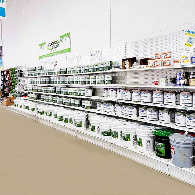 The paint section: where half-used cans become full-fledged possibilities, and your accent wall dreams are just a few dollars away.