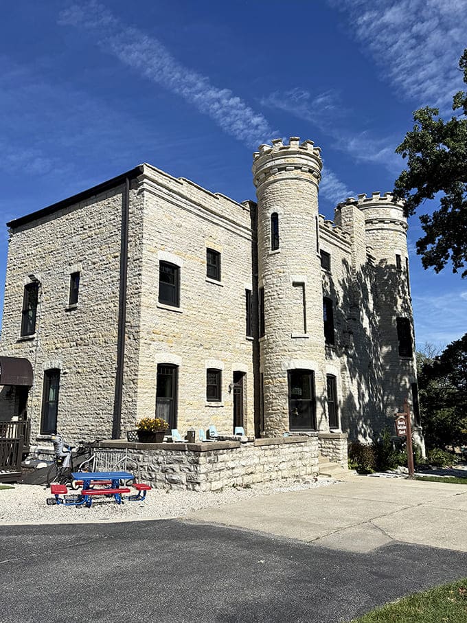 Side view reveals the castle's impressive silhouette against Chicago's sky&mdash;medieval dreams with a Midwestern zip code.
