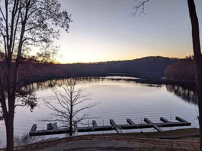 Sunset paints Burr Oak Lake in watercolor hues while empty boat docks wait for tomorrow's adventures&mdash;nature's perfect nightcap.