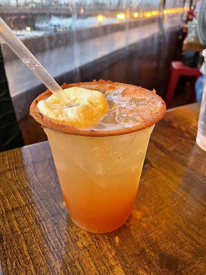 This sunset-hued cocktail isn't just a drink&mdash;it's a vacation in a glass. The apple cider mimosa brings orchard freshness to waterfront dining.