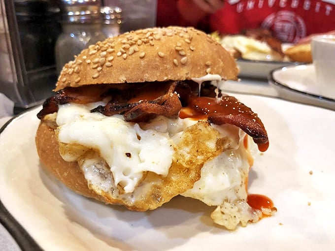 This breakfast sandwich isn't just food &ndash; it's structural engineering with melted cheese as the architectural glue holding breakfast perfection together.