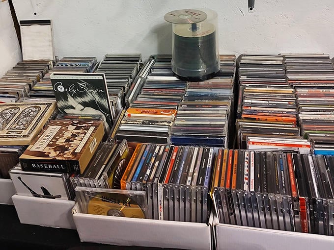 Music history stacked in plastic cases. Dig through these CD treasures and you might just find that album that defined your sophomore year.