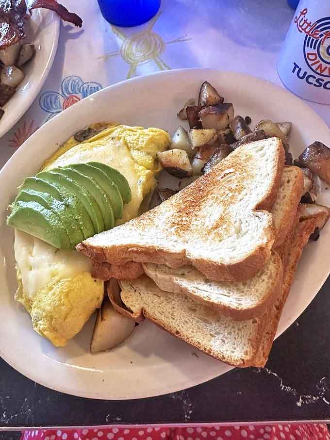 An omelet with avocado and toast &ndash; for when you want to pretend you're being healthy while still enjoying every decadent bite.