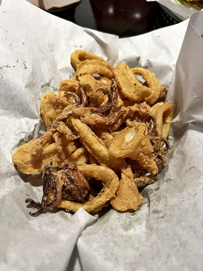 Crispy calamari that's traveled from ocean depths to fryer perfection&mdash;Neptune himself would approve of this golden treasure.