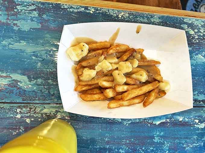 Fries with cheese curds&mdash;because sometimes your hot dog needs a sophisticated friend who understands the importance of melty goodness.