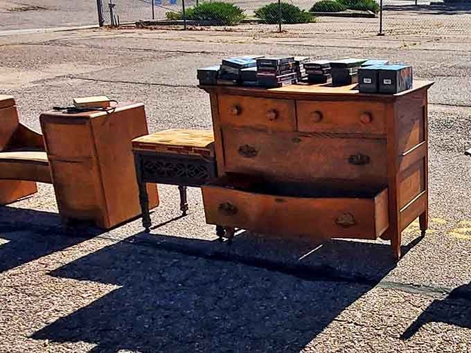 Vintage furniture with stories to tell, basking in the Colorado sunshine. That dresser has probably seen more history than your high school textbook.