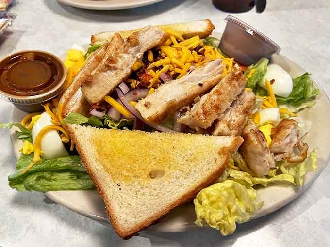 A salad that doesn't feel like punishment&mdash;fresh greens, grilled chicken, and enough cheese to remind you that pleasure still exists.