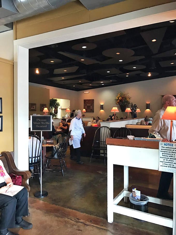 The "Please Wait To Be Seated" sign might as well read "Patience Will Be Rewarded With Culinary Bliss."