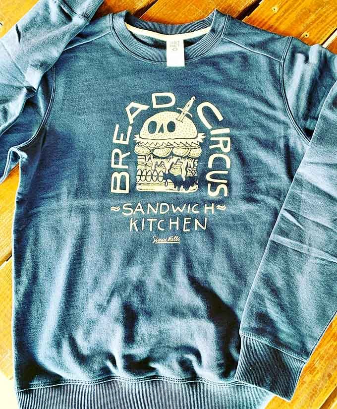 Even the merch tells a story&mdash;a skull sandwich design that says "I take my lunch seriously enough to wear it on my sleeve."