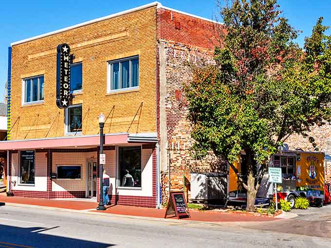 The Meteor Guitar Gallery occupies a historic brick building, where musical instruments and performances resonate through walls that have heard a century of stories.