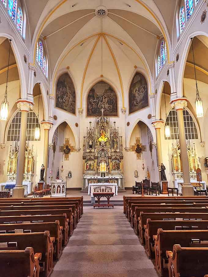 Sacred Heart's soaring ceiling and stained glass windows create a peaceful sanctuary. Spiritual nourishment comes with a side of architectural awe.