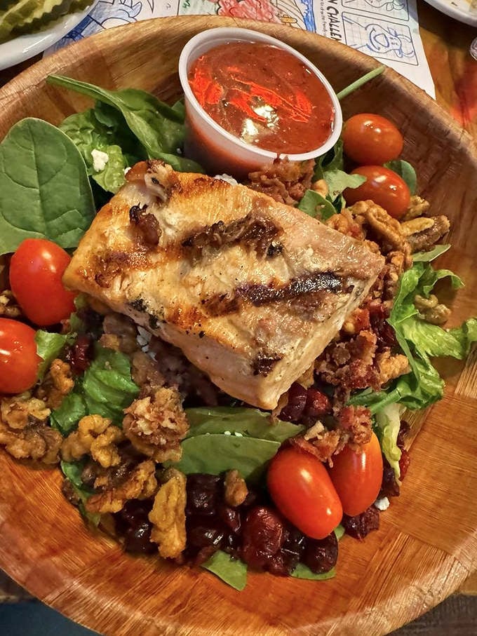 This isn't just a salad &ndash; it's a protein-packed flavor festival where grilled salmon takes center stage.