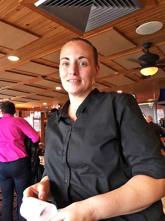 The unsung heroes of diner magic &ndash; where efficiency meets genuine hospitality. That smile says, "Your pancakes are worth the wait."