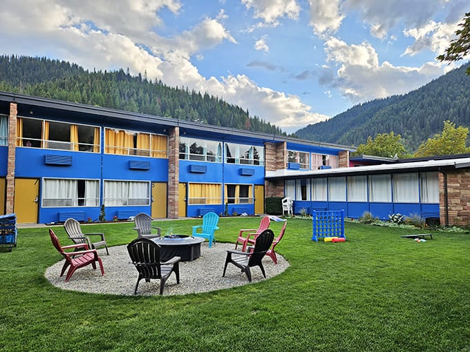 The Stardust Motel embraces mid-century modern with unapologetic flair. Those colorful Adirondack chairs practically beg you to sit and watch the mountains change colors.