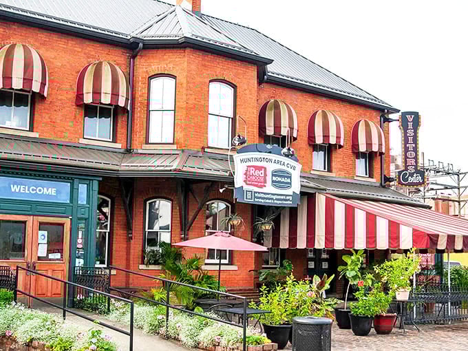 The Visitor Center's welcoming brick fa&ccedil;ade and striped awnings invite newcomers to discover Huntington's affordable charms.