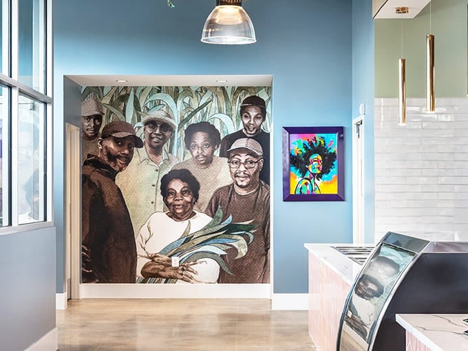 Wall art that feeds your soul while you wait for food to feed your body. This mural pays homage to the cultural roots that make Southern cuisine so profound.