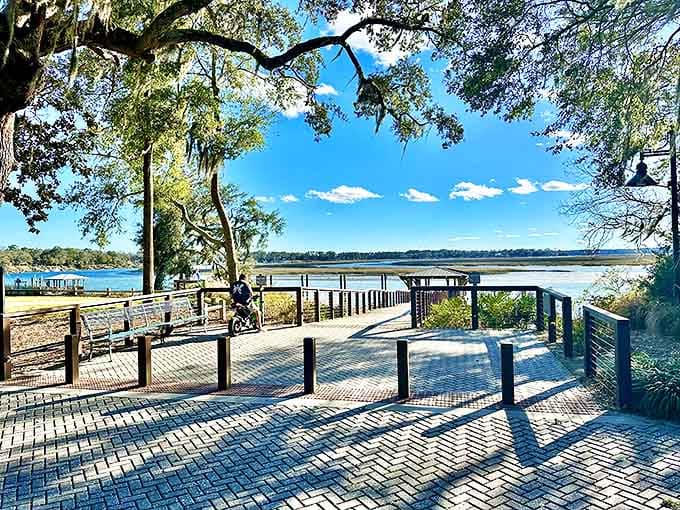 Wright Family Park's riverside boardwalk offers front-row seats to nature's daily performance, where tidal rhythms set the pace for unhurried Lowcountry living.
