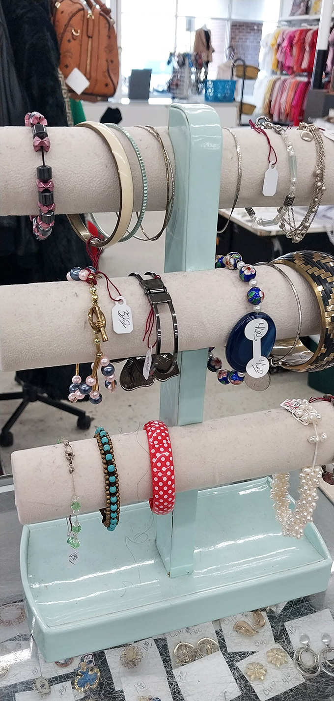 Jewelry that tells stories. Each bracelet and necklace once adorned someone else's life before waiting for you on these display stands.