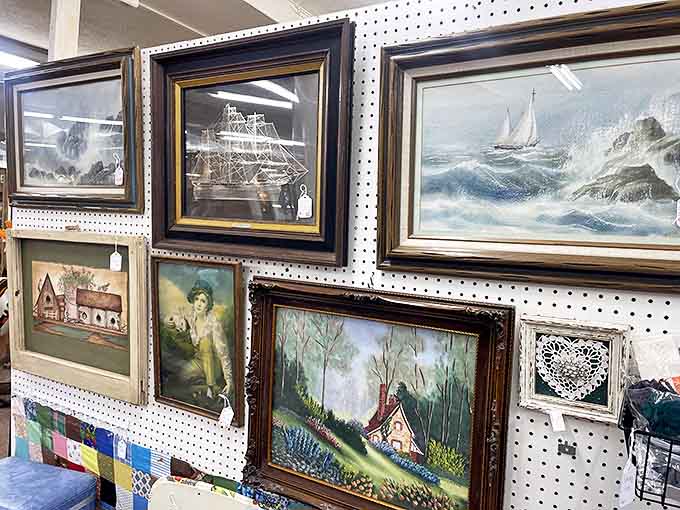 The art wall&mdash;where seascapes, landscapes, and portraits create a gallery of forgotten talents waiting for their rediscovery moment.